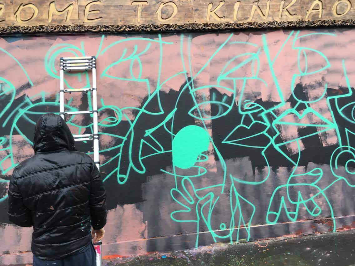 Hunto's colourful street art brightens up a rainy day on Brick lane ...