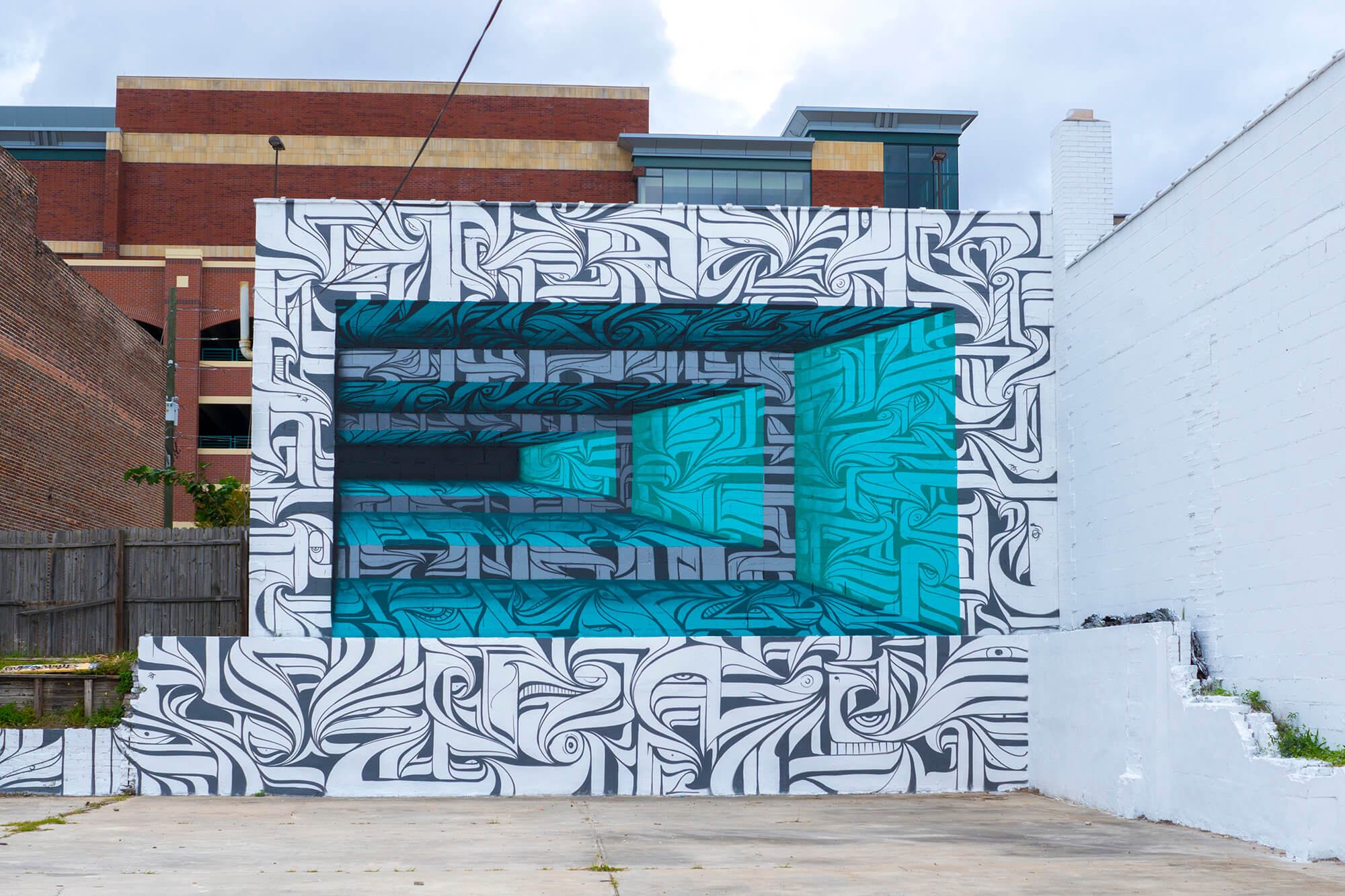 Street artist Astro creates an illusion of depth, Jacksonville, Florida ...